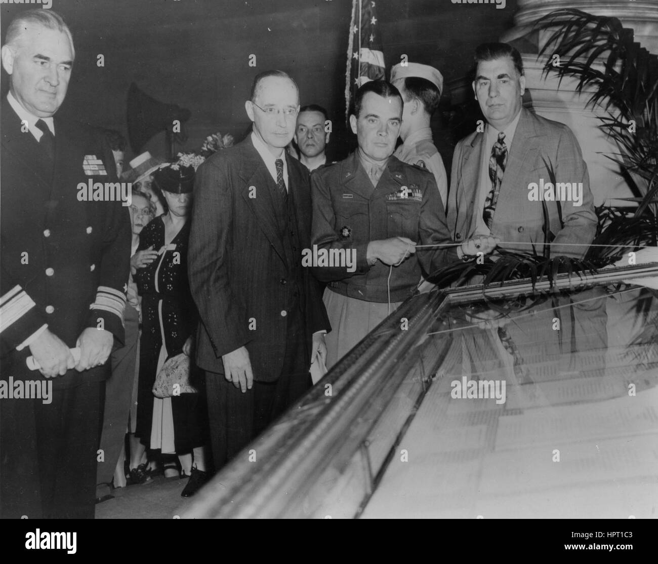 General Anthony Clement McAuliffe (front, second from right) unveils ...