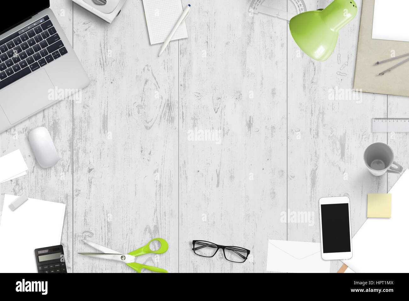 Office desk with computer, phone and stationery. Top view of white ...