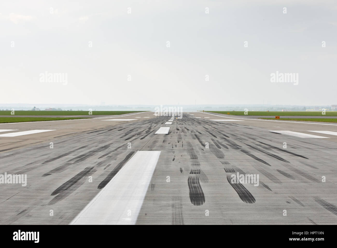 Airport - Striped line on the runway Stock Photo - Alamy