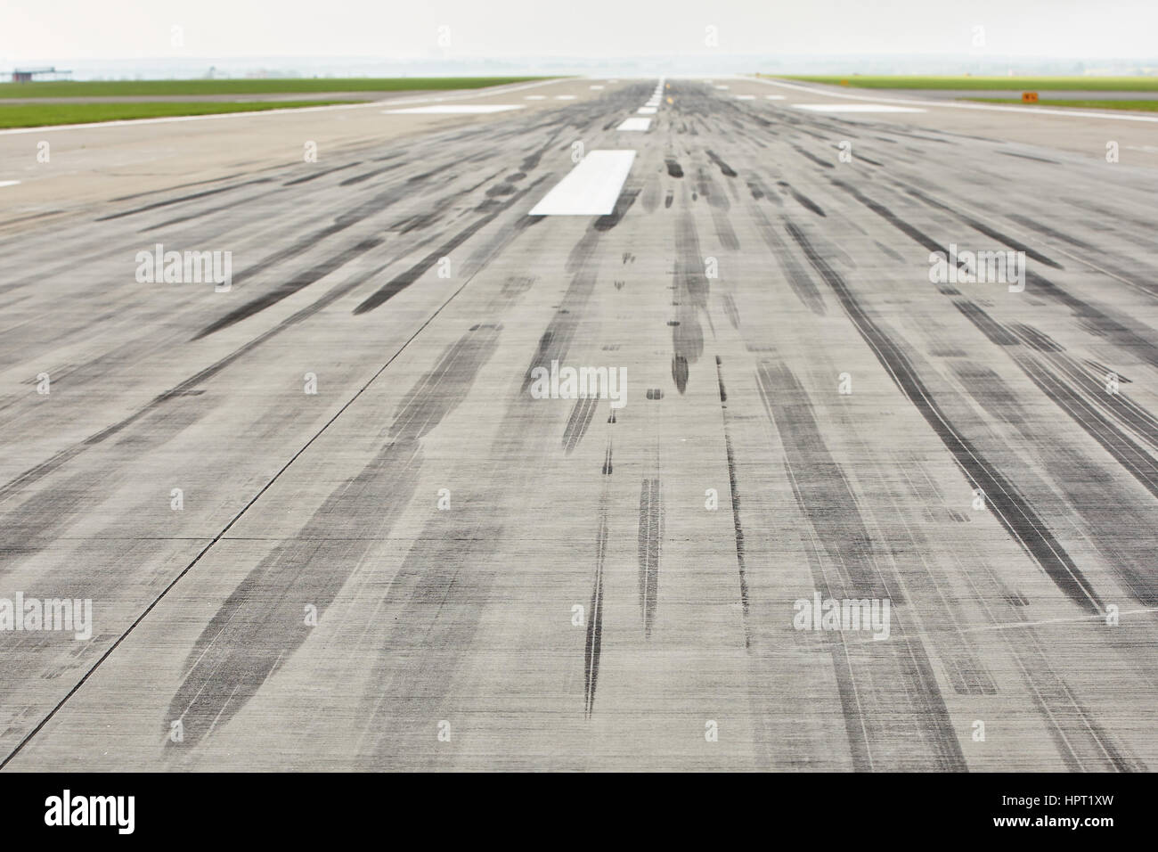 Airport - Striped line on the runway Stock Photo - Alamy