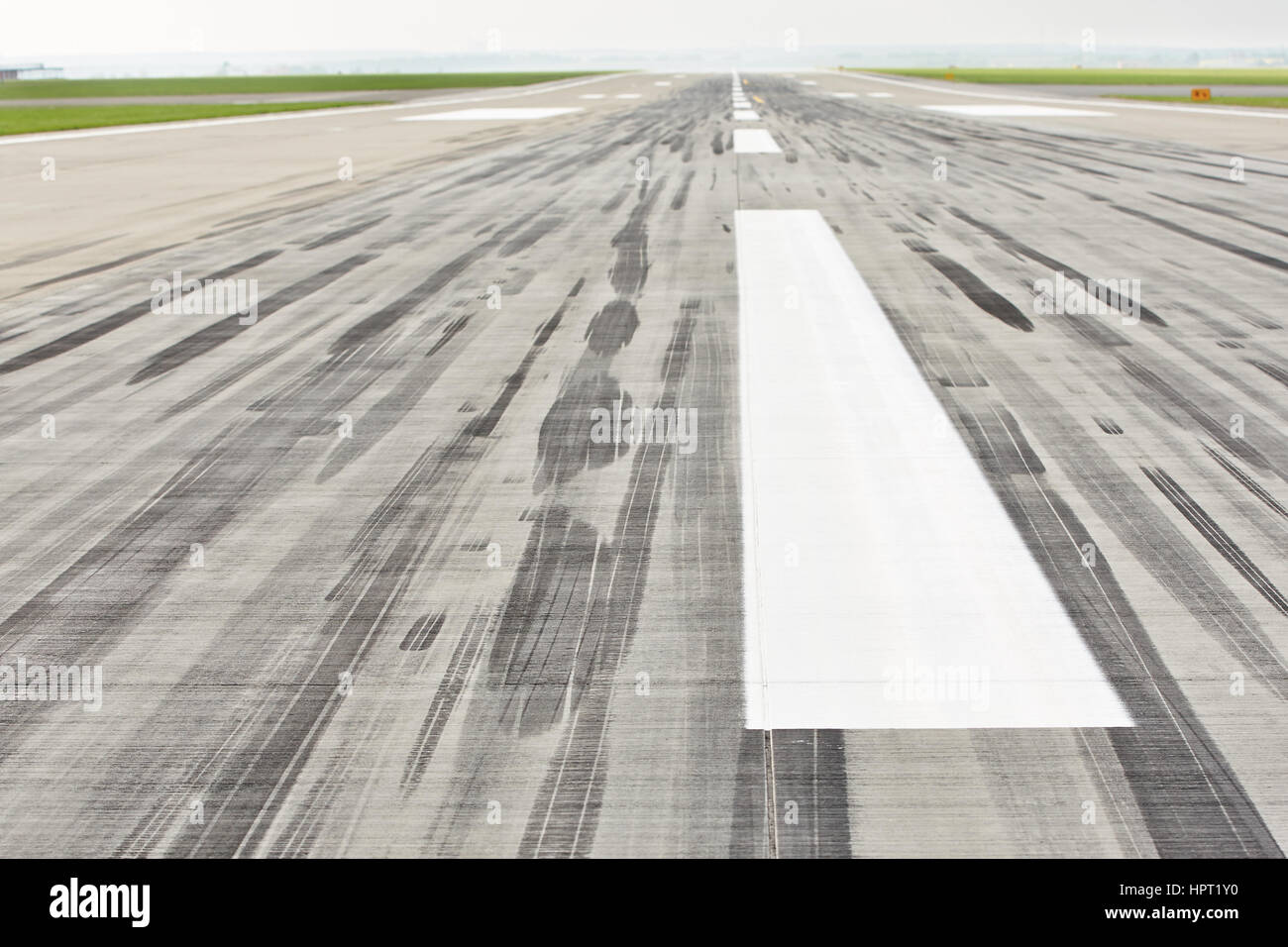 Airport - Striped line on the runway Stock Photo - Alamy