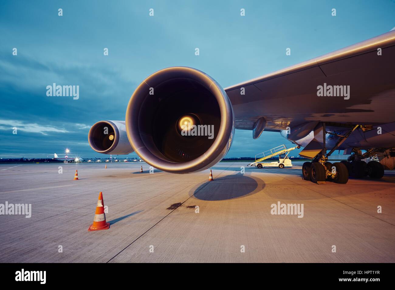 Two engines of the large airplane at the airport Stock Photo - Alamy