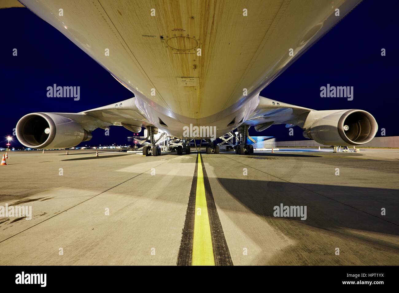 Loading of cargo to the freight aircraft Stock Photo - Alamy