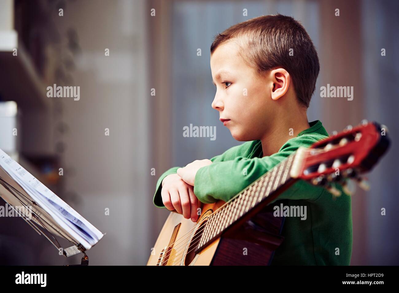 Boy music guitar hi-res stock photography and images - Alamy