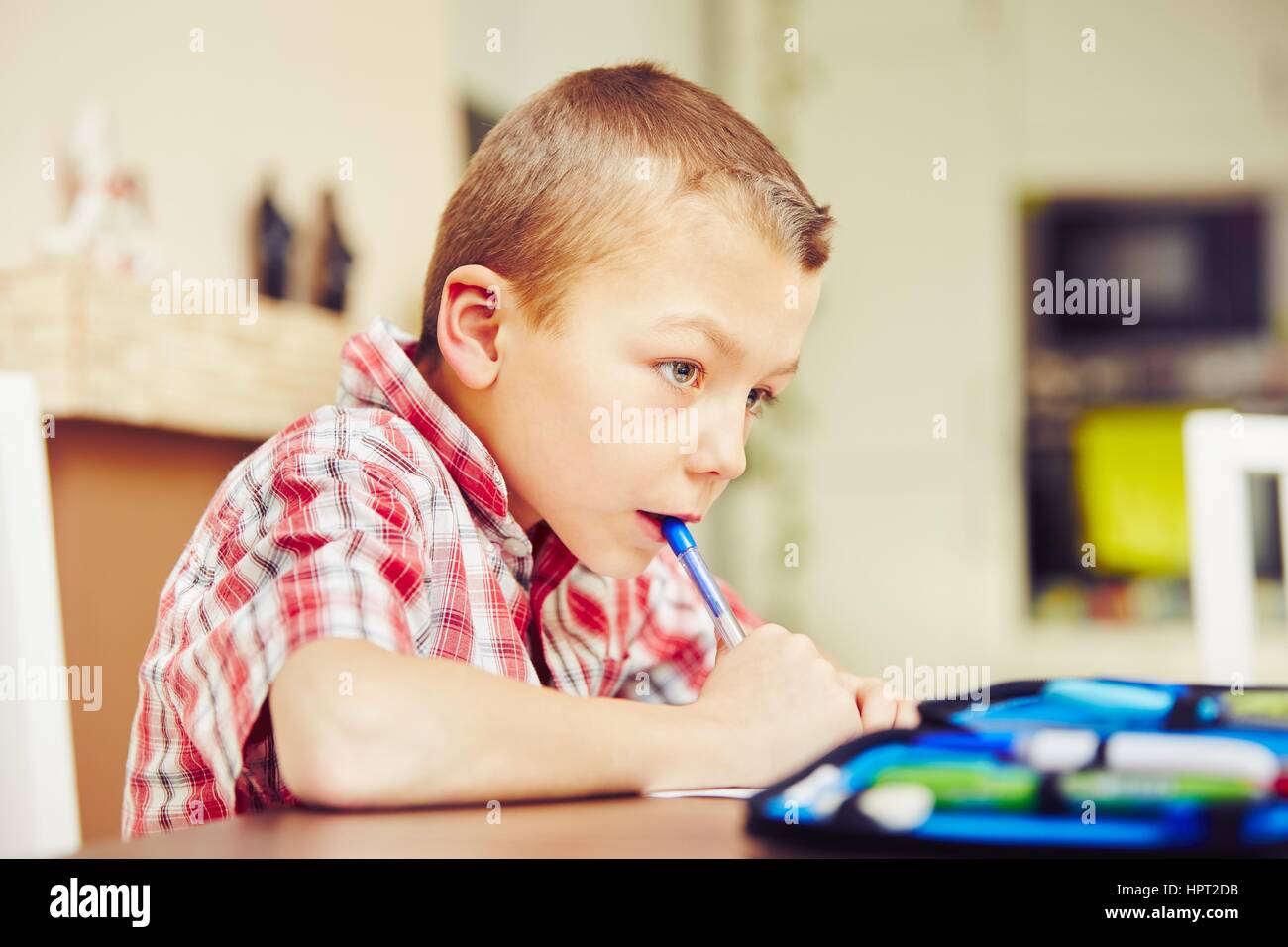 Child study homework hi-res stock photography and images - Alamy