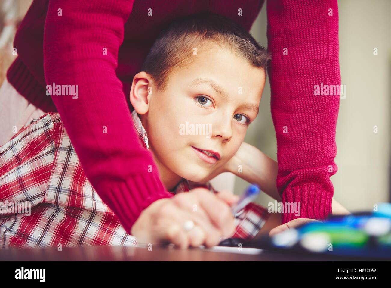 Little boy is doing his homework for elementary school Stock Photo - Alamy