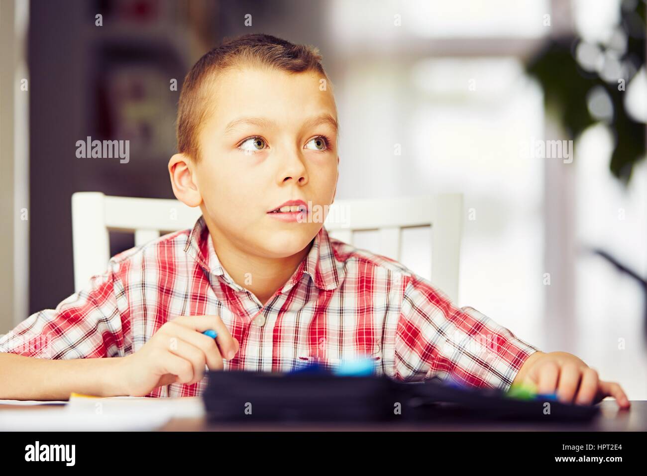 Little boy is doing his homework for elementary school Stock Photo - Alamy