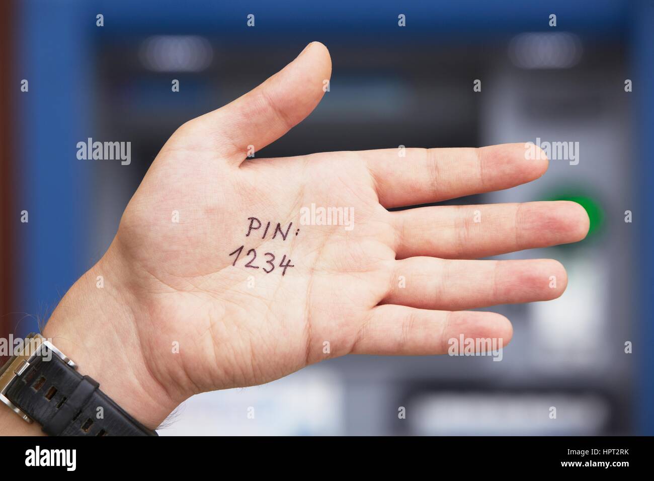 Bad idea - simple PIN code written on the palm Stock Photo - Alamy