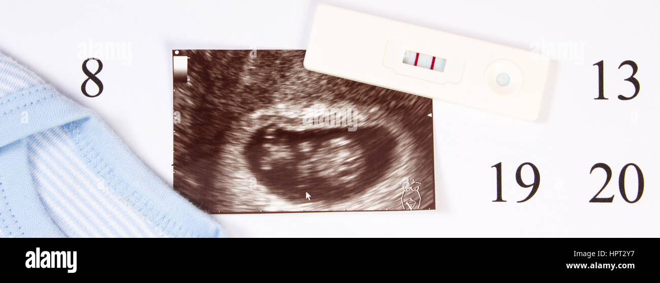 Pregnancy test with positive result, ultrasound scan of baby and ...