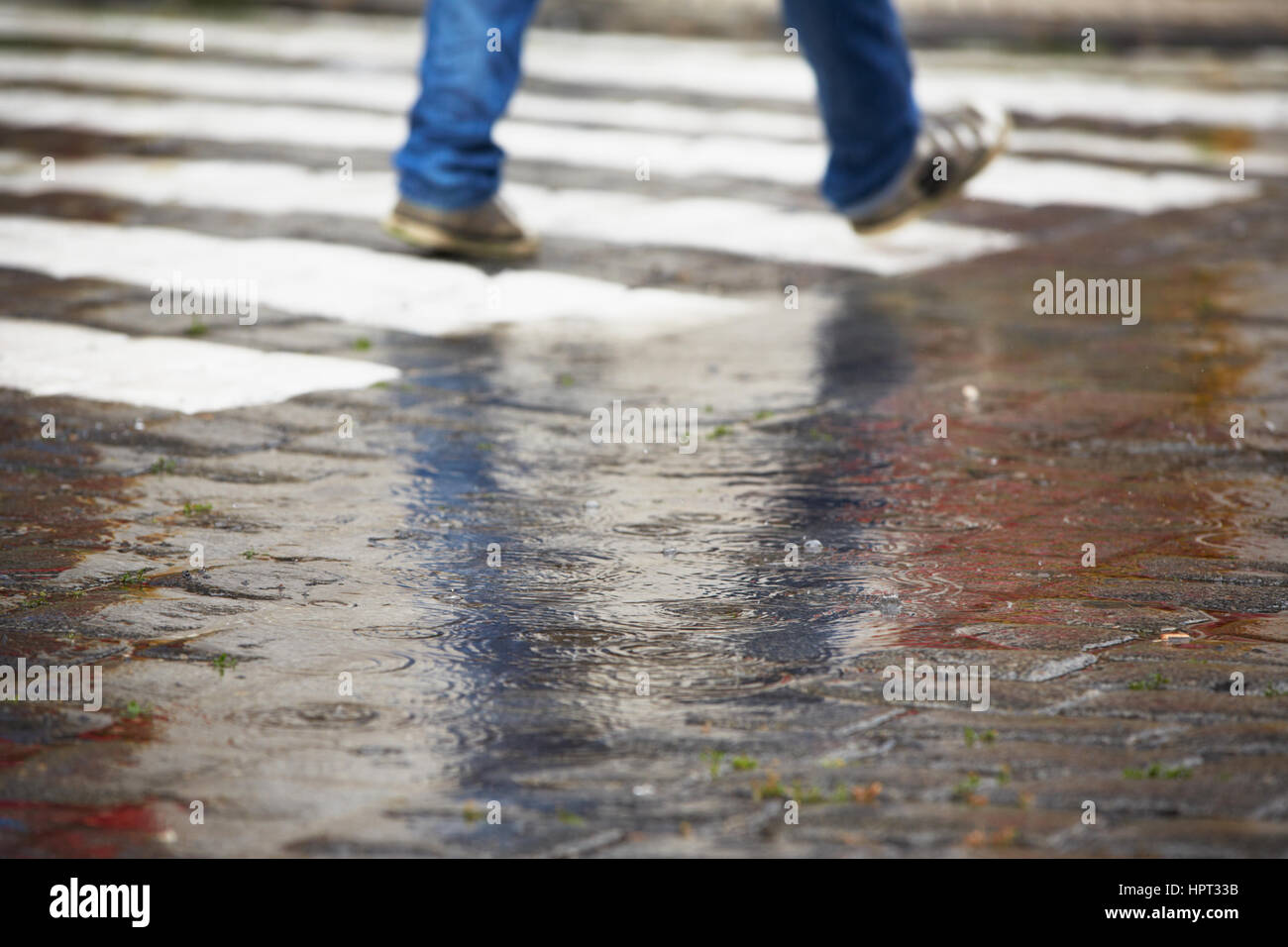 People walking in heavy rain hi-res stock photography and images - Alamy