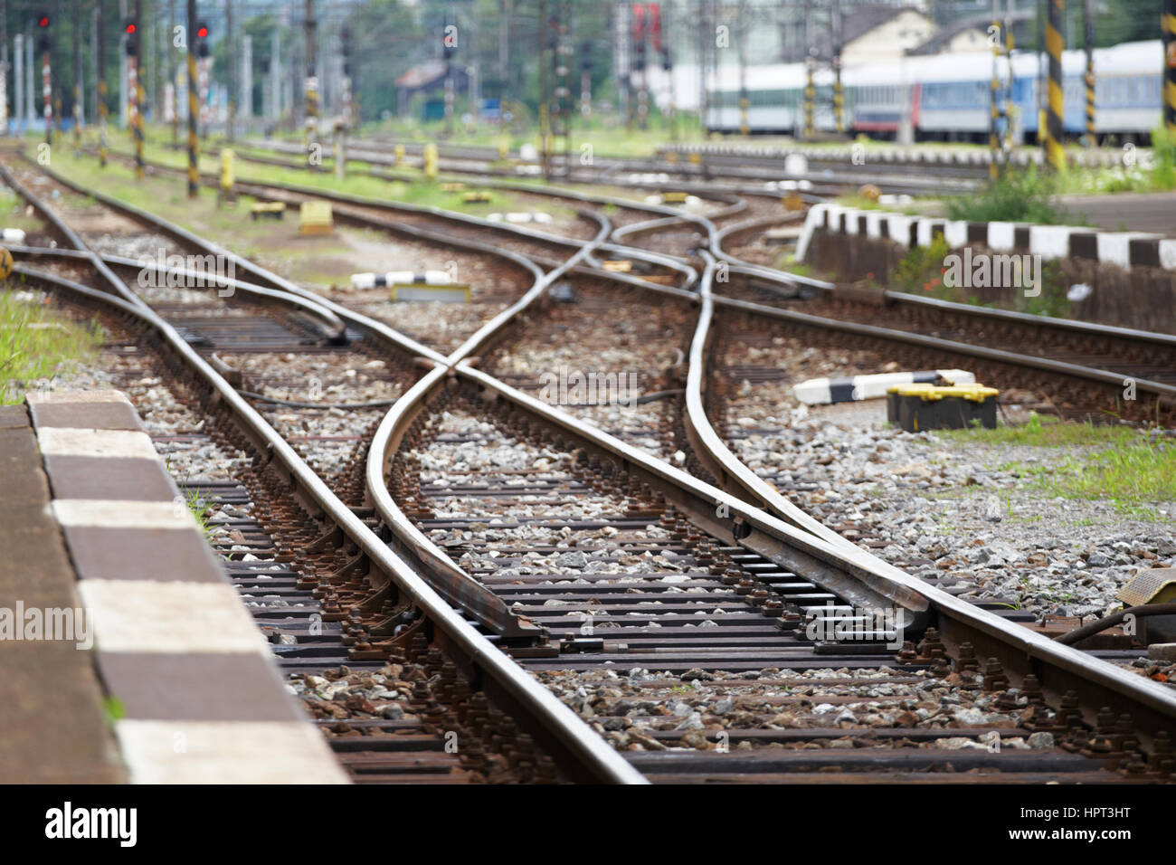 Railway tracks in front of the station Stock Photo - Alamy