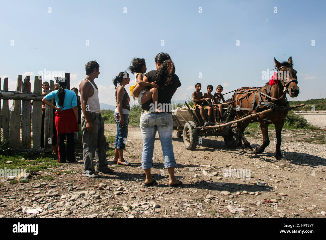Tarlungeni, Brasov, Romania, August 22, 2009: Gypsy family is looking ...