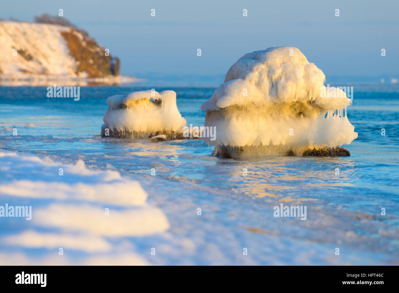 Ice covered shore of the sea at dawn, Sakhalin, Russia Stock Photo - Alamy