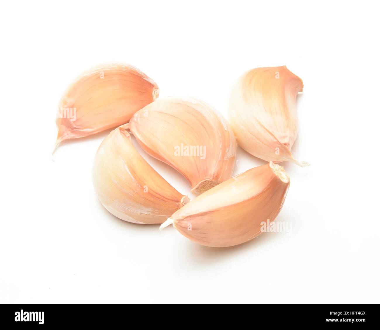garlic cloves isolated on white background Stock Photo - Alamy