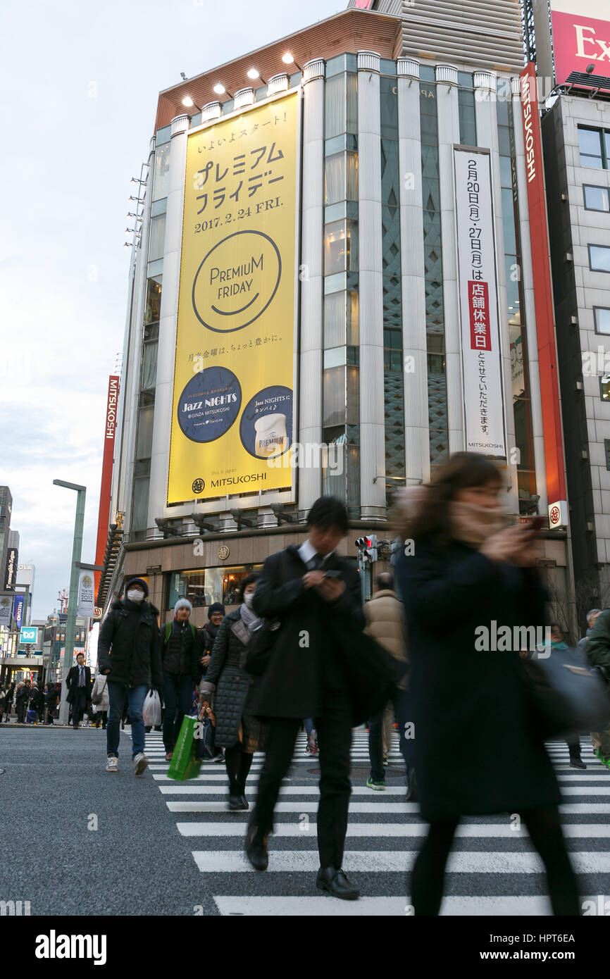 A Premium Friday signboard on display outside Mitsukoshi department ...