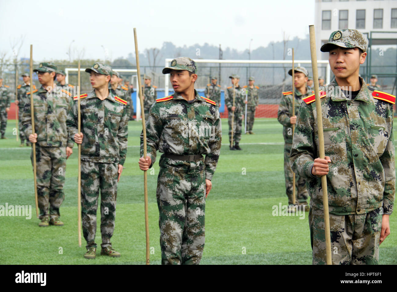 Hangzhou, China. 24th Feb, 2017. College students take part in military ...