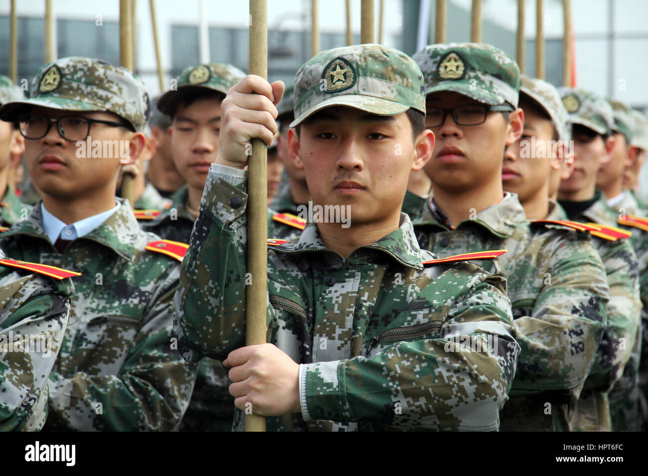 Hangzhou, China. 24th Feb, 2017. College students take part in military ...