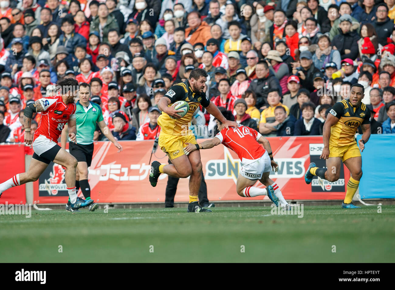 Ben May (C) of the Hurricanes in action for HITO-Communications ...