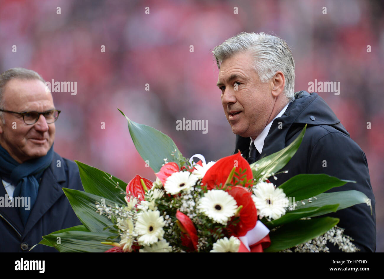 Munich, Germany. 25th Feb, 2017. Munich's coach Carlo Ancelotti (R ...