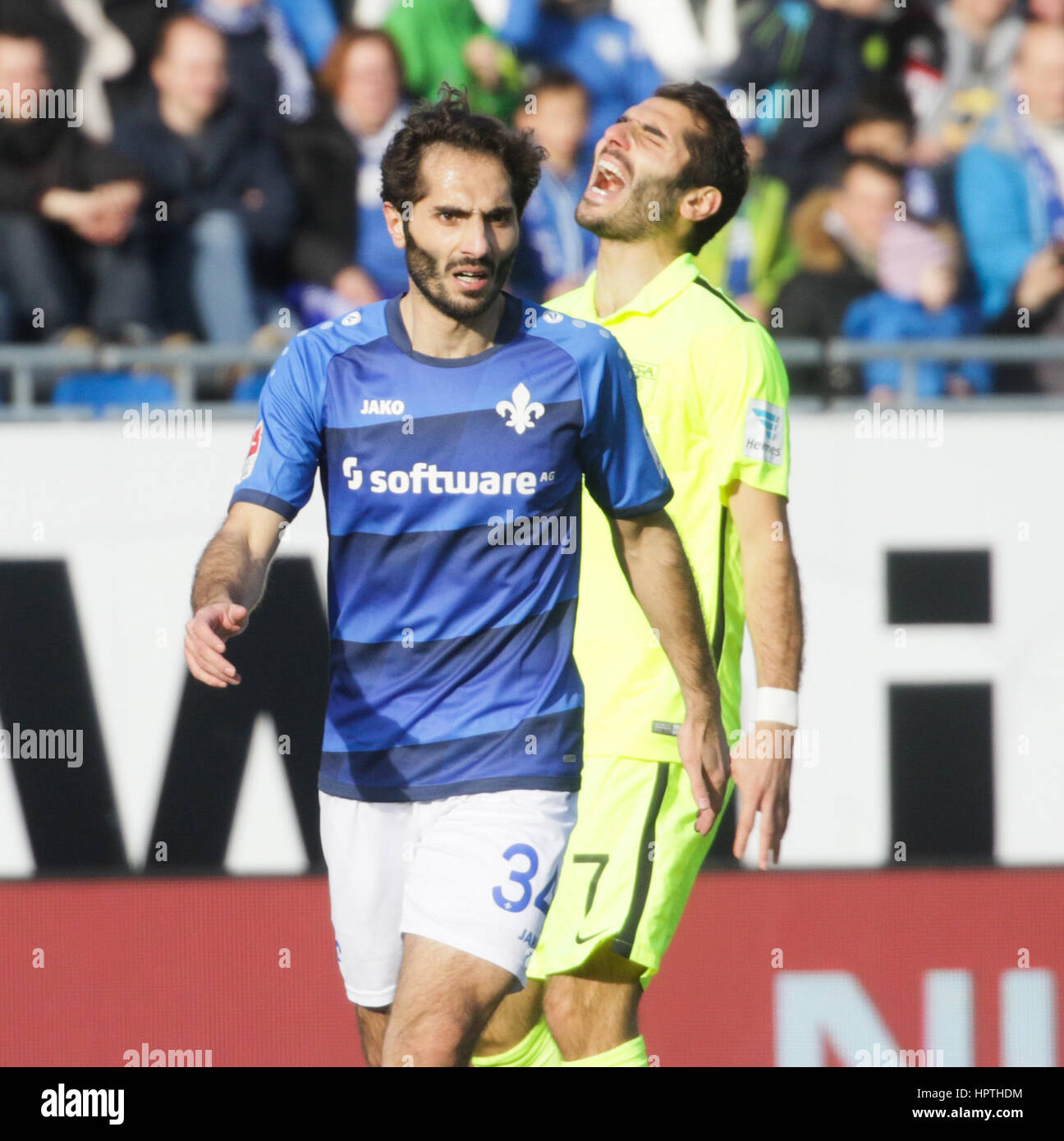 Darmstadt, Germany. 25th Feb, 2017. Augsburg's Halil Altintop (L) and ...