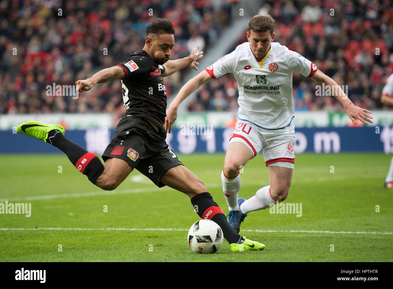 Leverkusen, Germany. 24th Feb, 2017. Leverkusen's Karim Bellarabi (L ...