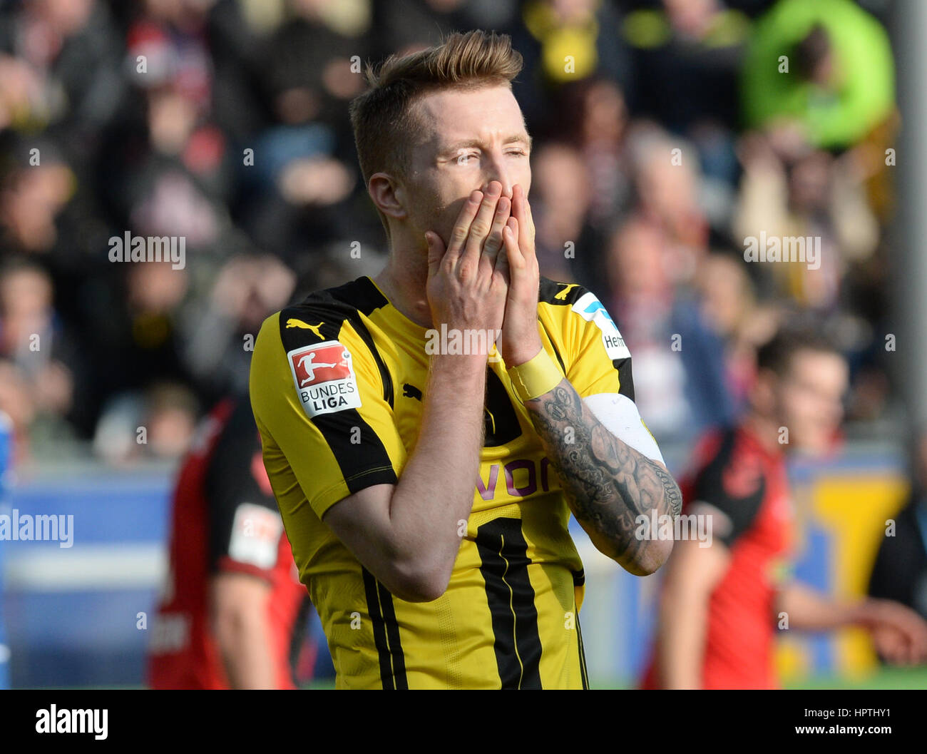 Marco Reus from Dortmund with his hands to his face after a missed ...