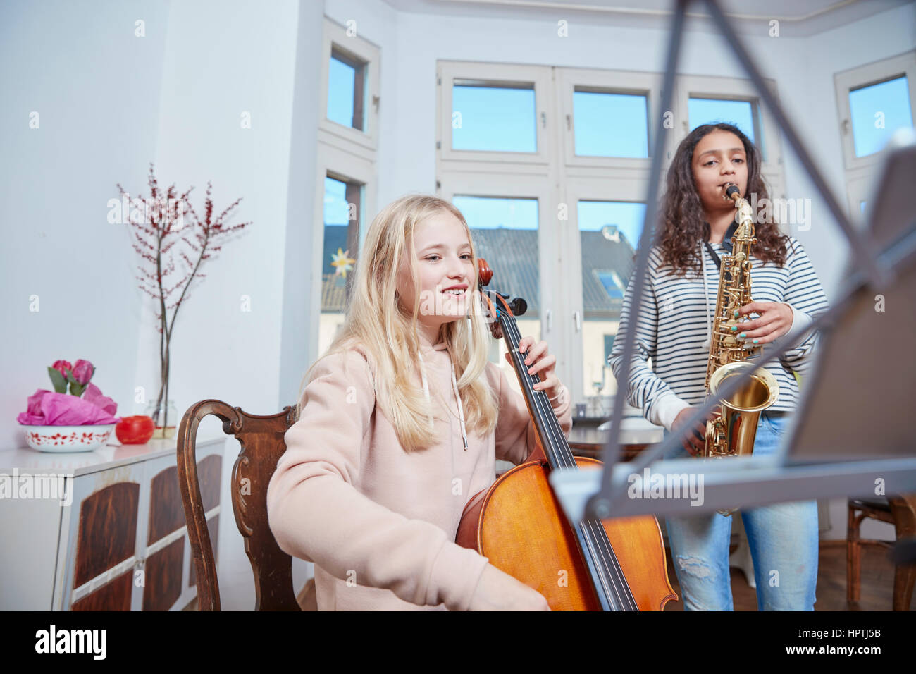 Saxophone playing hi-res stock photography and images - Alamy