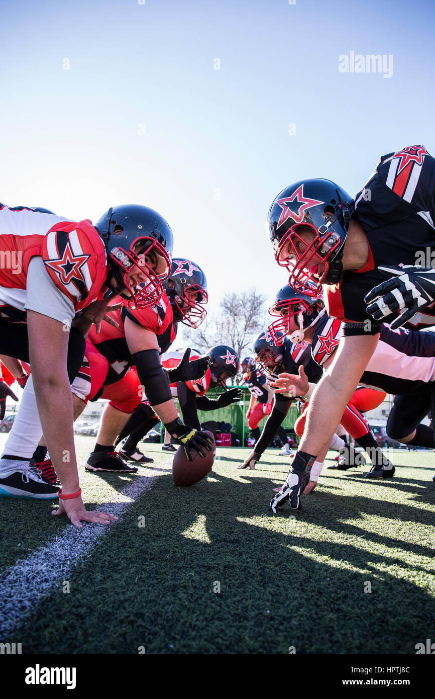 American football players on the line of scrimmage during a match Stock ...