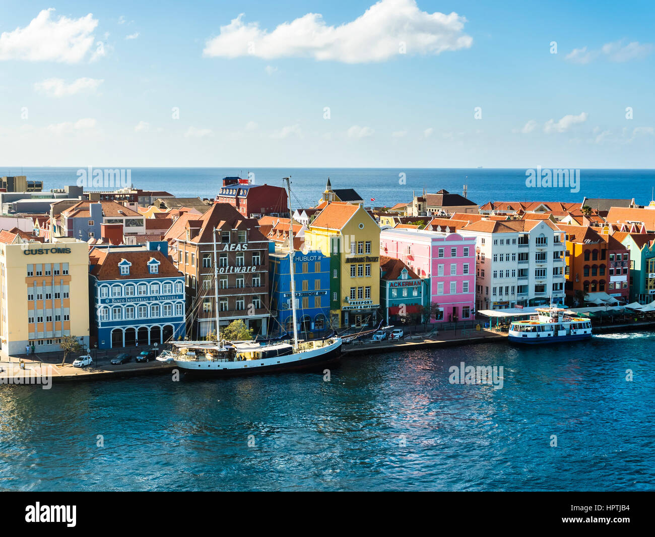 Curacao, Willemstad, Punda, schooner and colorful houses at waterfront ...