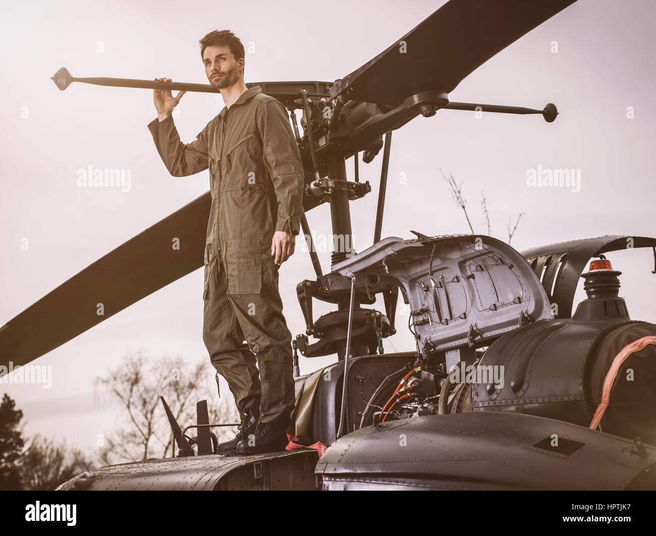 Man standing on helicopter hi-res stock photography and images - Alamy
