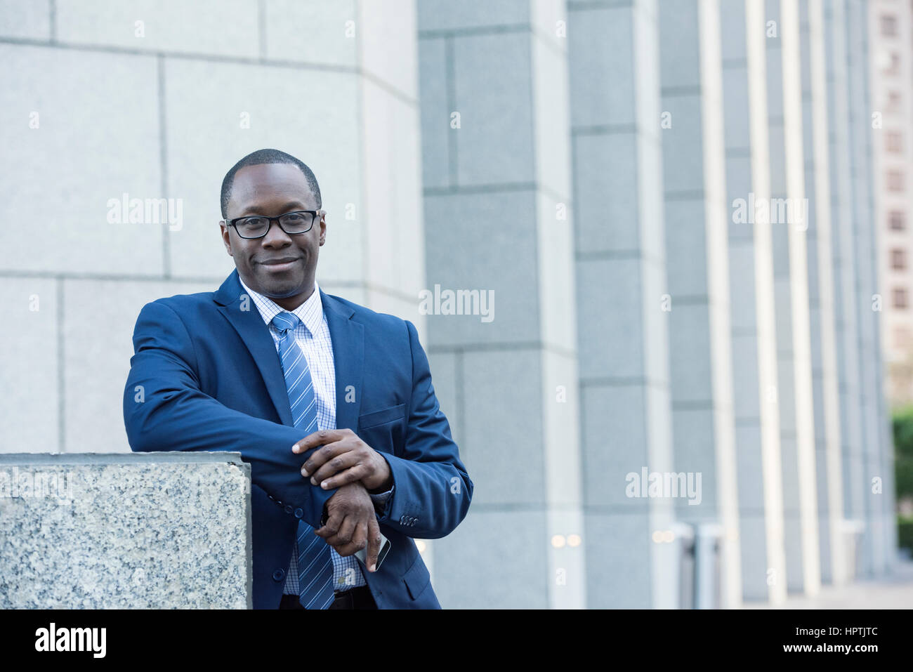 Portrait of confident businessman Stock Photo - Alamy