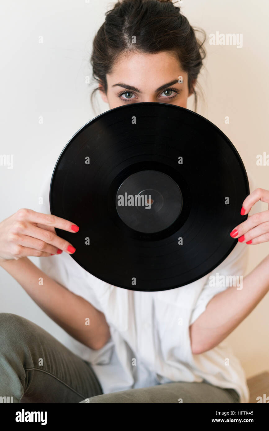 Woman with record Stock Photo - Alamy