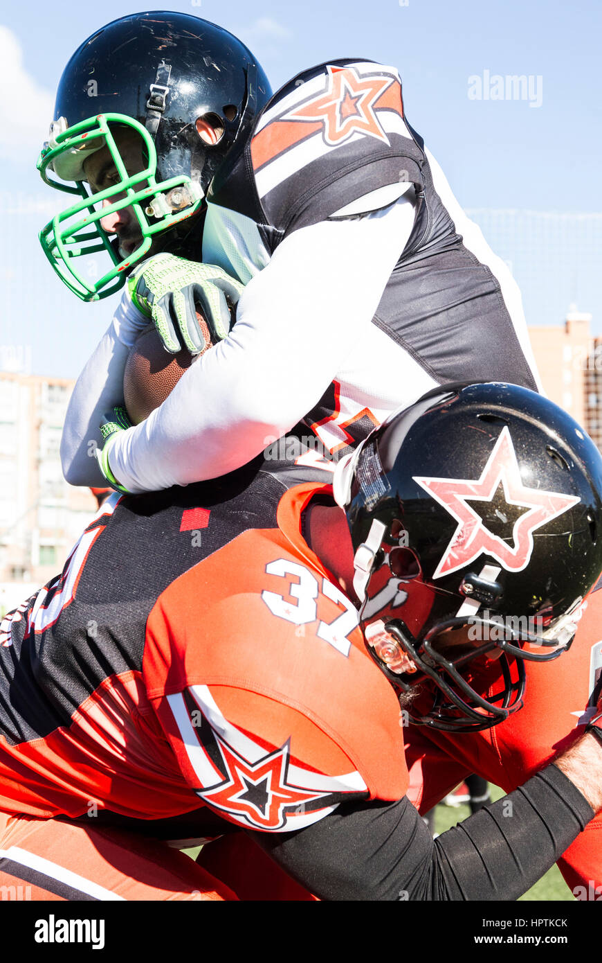 Two football players fight hi-res stock photography and images - Alamy