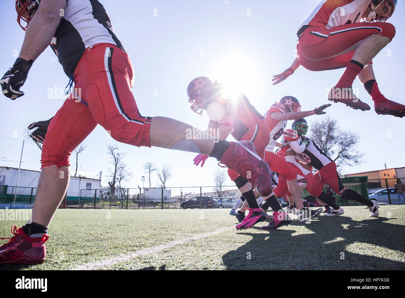 American football player jumping ball hi-res stock photography and ...