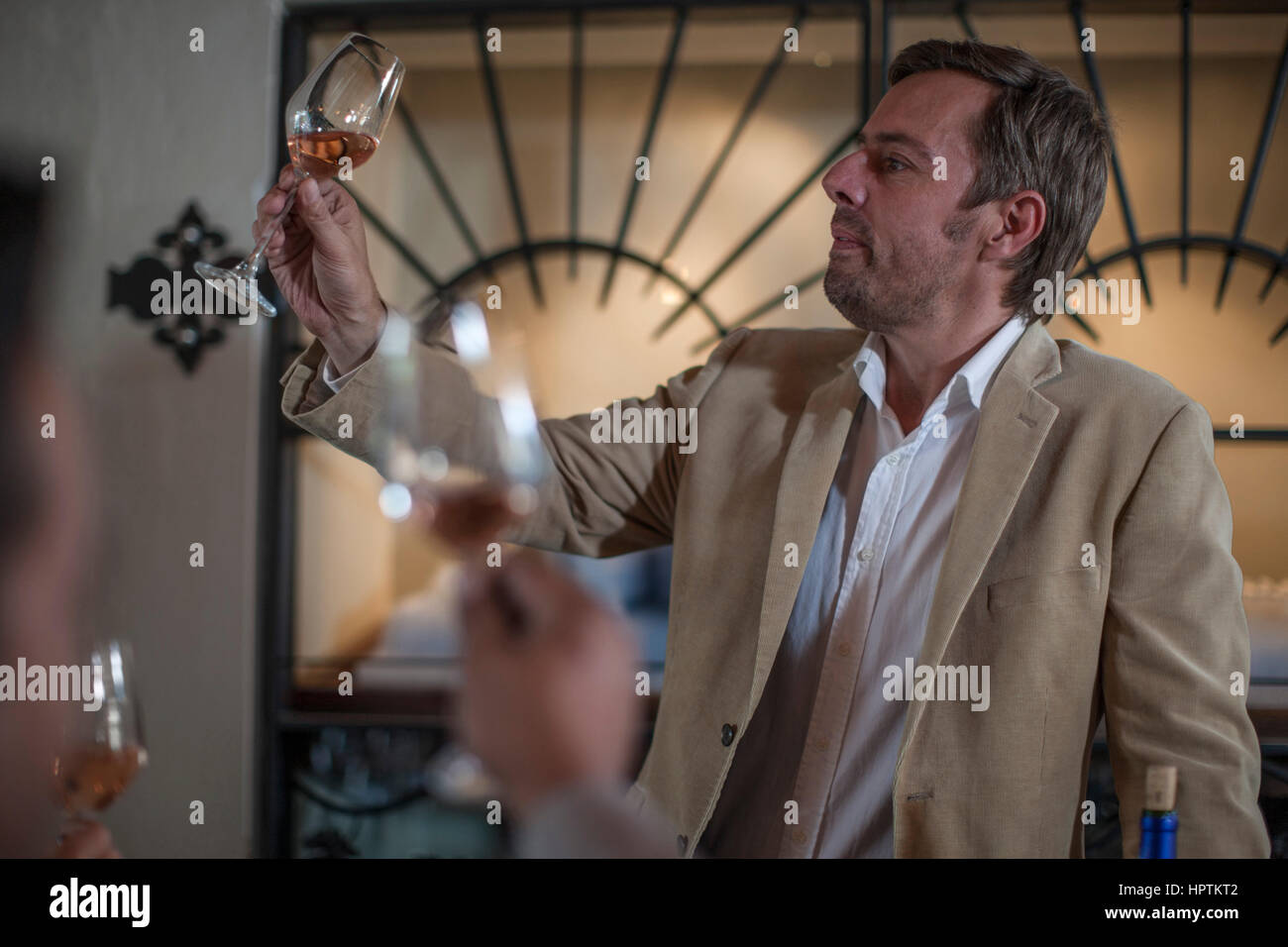Man tasting wine at restaurant Stock Photo - Alamy