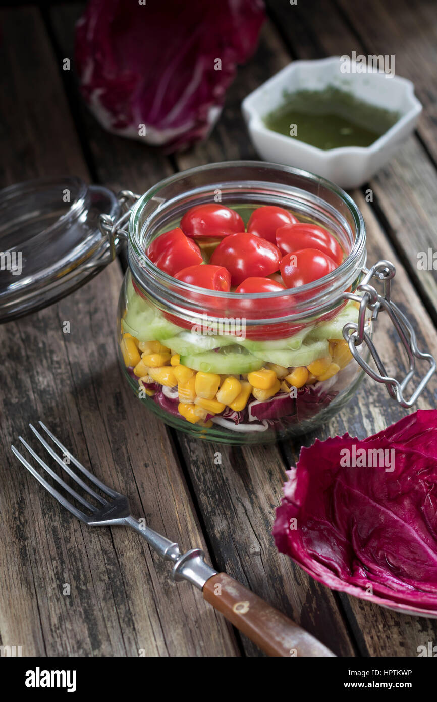 Preserving jar of salad with different vegetables Stock Photo - Alamy