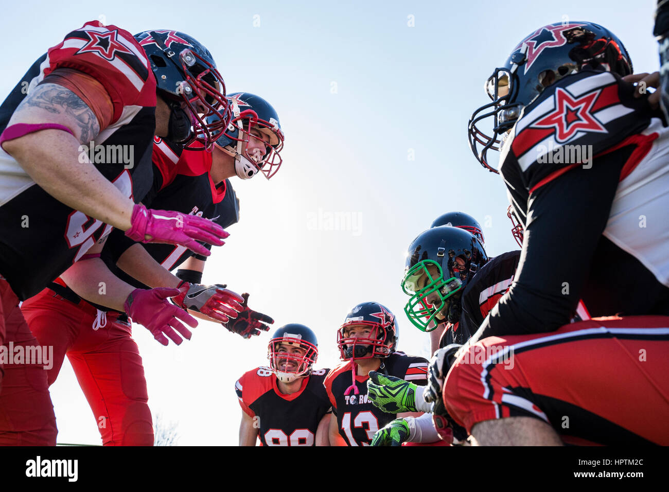 American football players talking and cheering before a game Stock ...