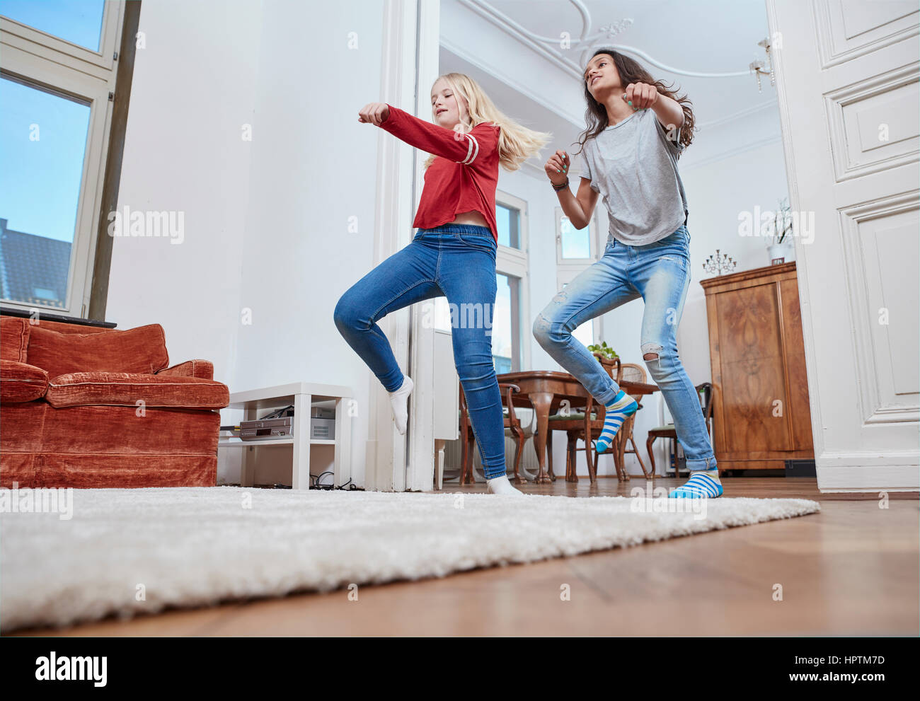 Two girls dancing at home Stock Photo - Alamy