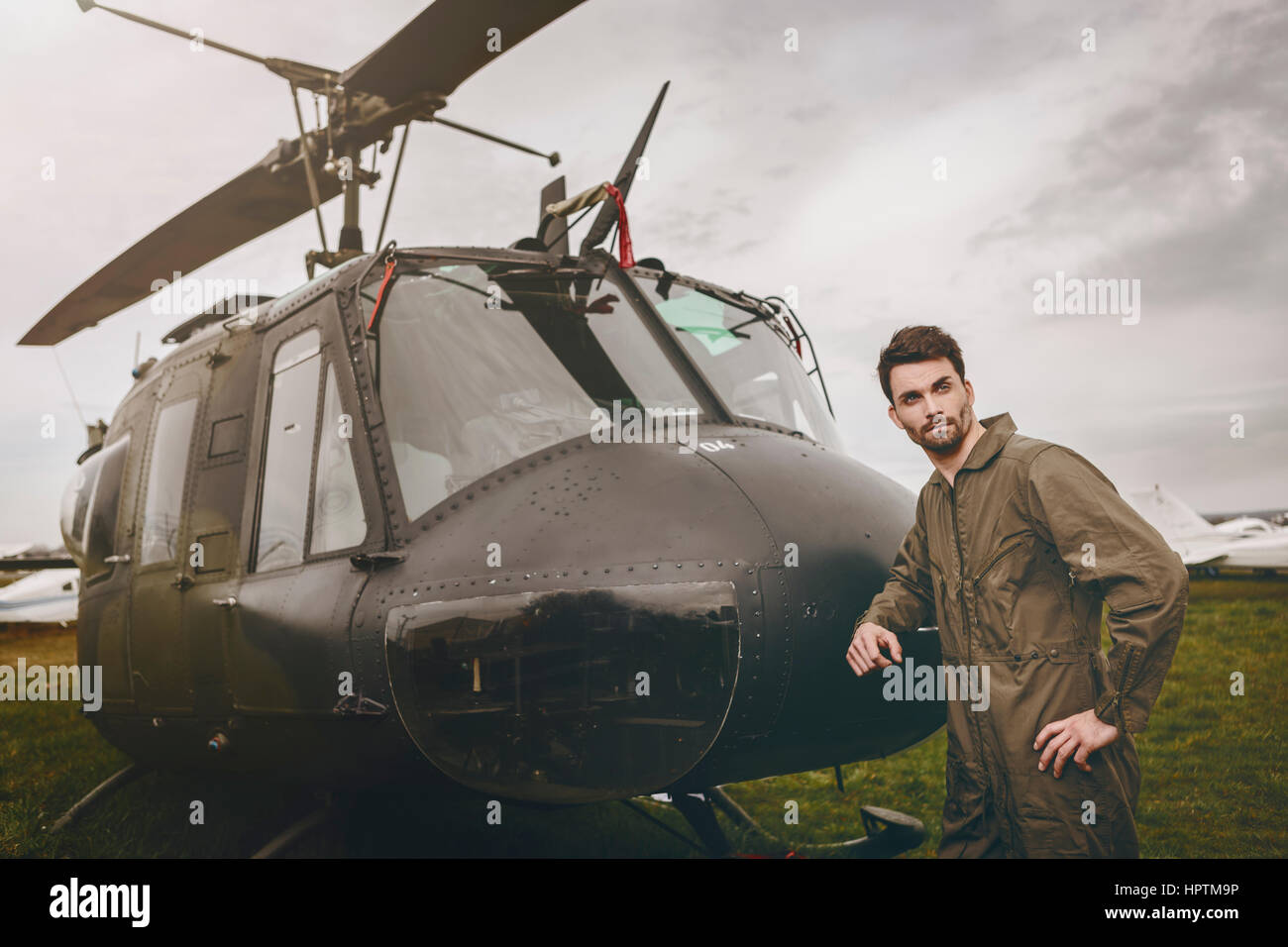 Portrait of pilot in helicopter 30 40 years hi-res stock photography ...