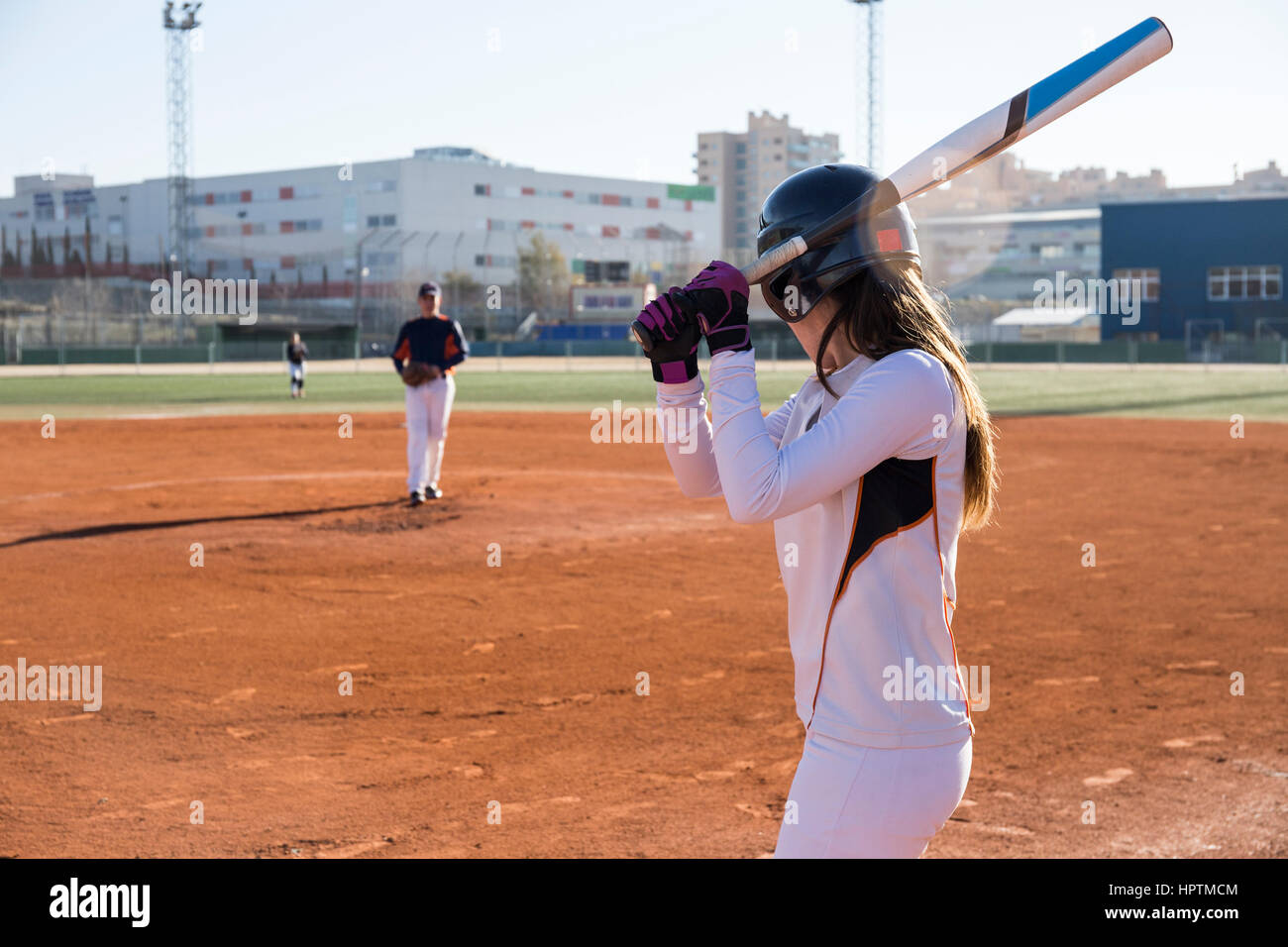 Female batter ready to hit the ball during a baseball game Stock Photo ...