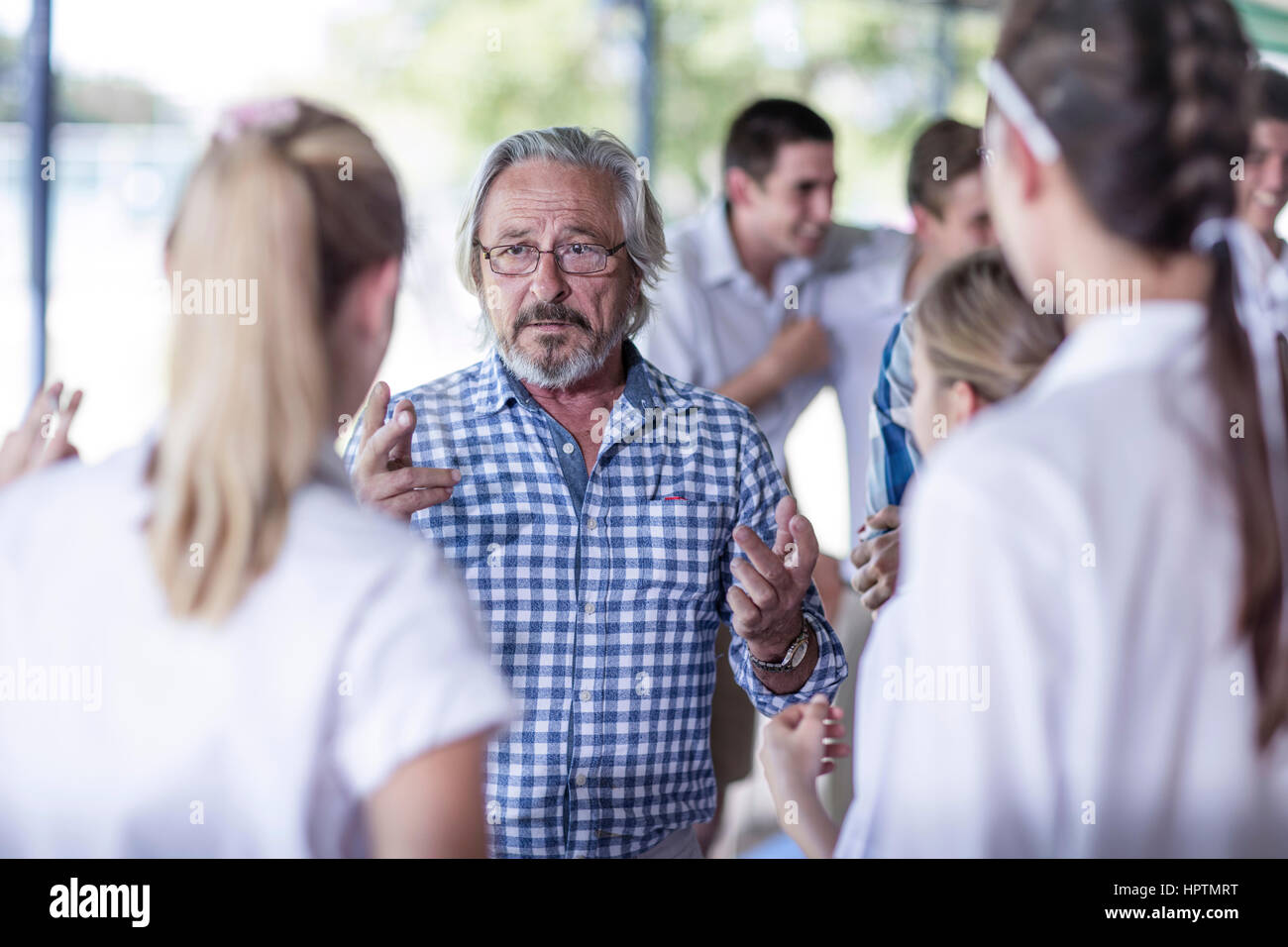 Principal talking to students hi-res stock photography and images - Alamy