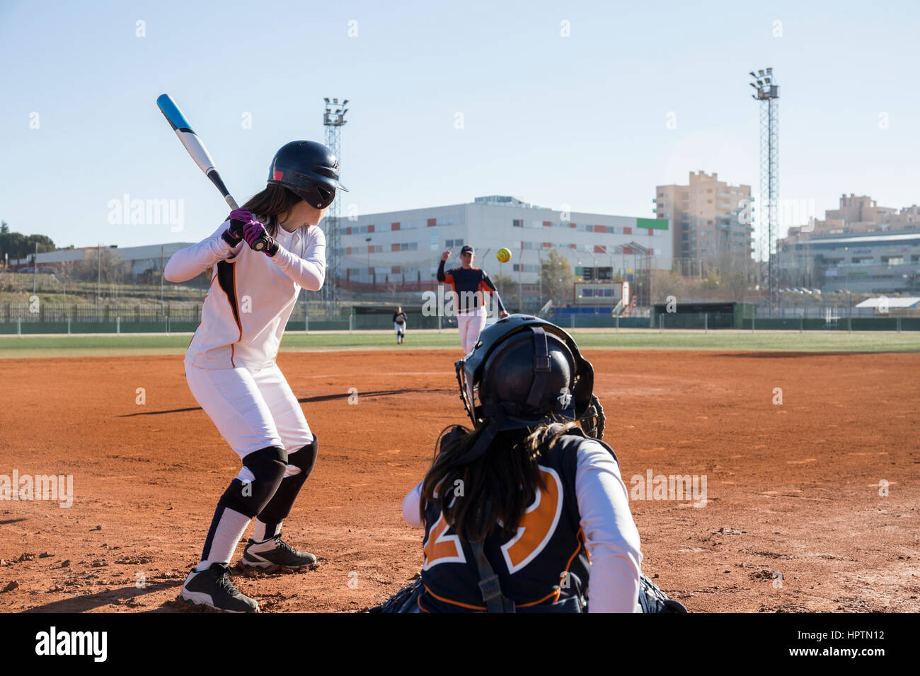 Female batter ready to hit the ball during a baseball game Stock Photo ...
