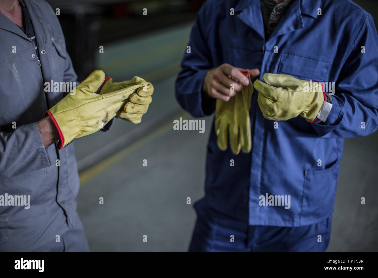 Close up factory workers hands hi-res stock photography and images - Alamy