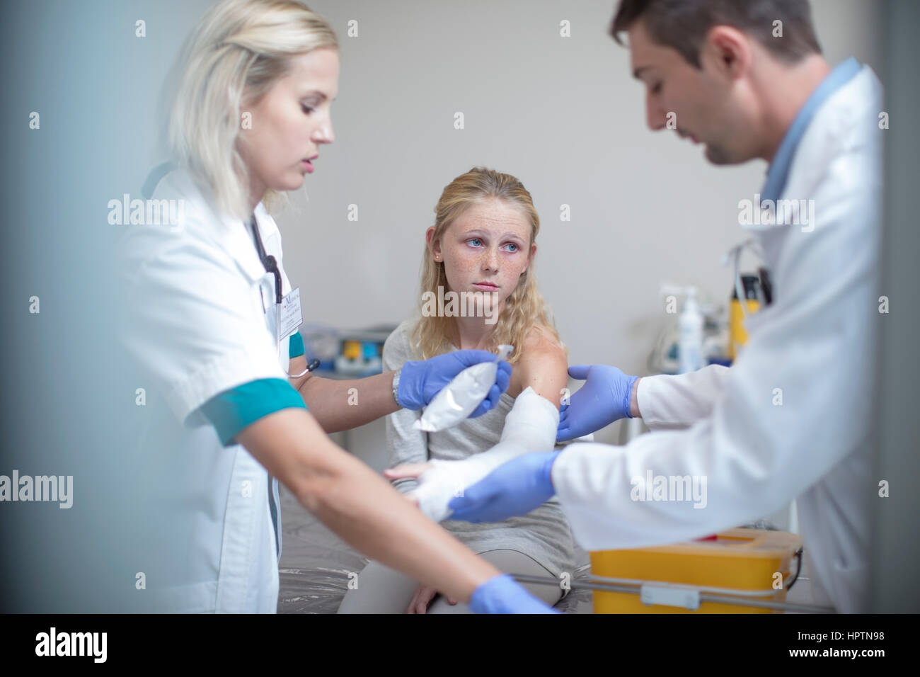 Injured girl getting treatment in hospital Stock Photo - Alamy