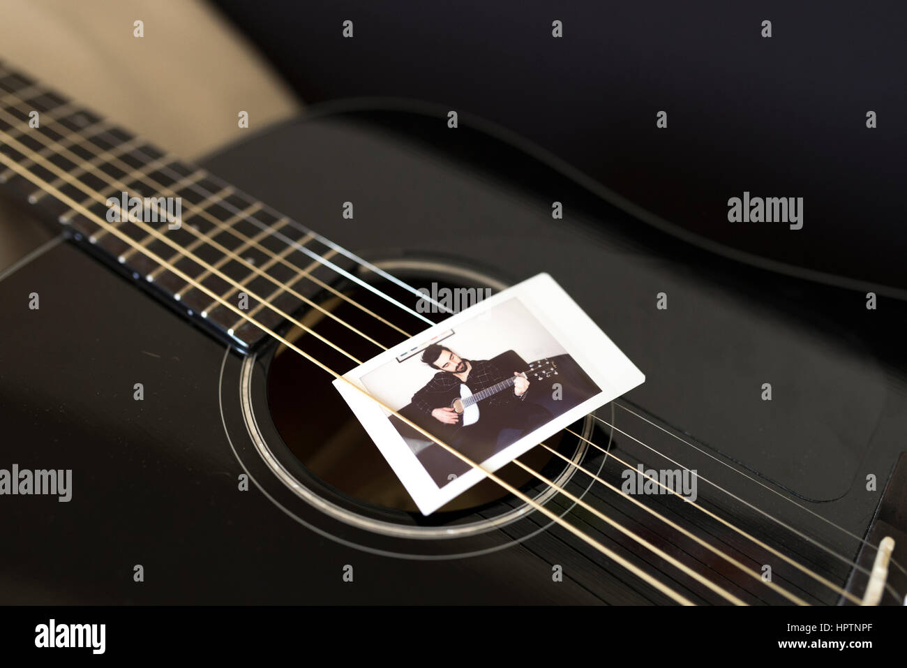 Guitar and photography of a man playing guitar Stock Photo - Alamy