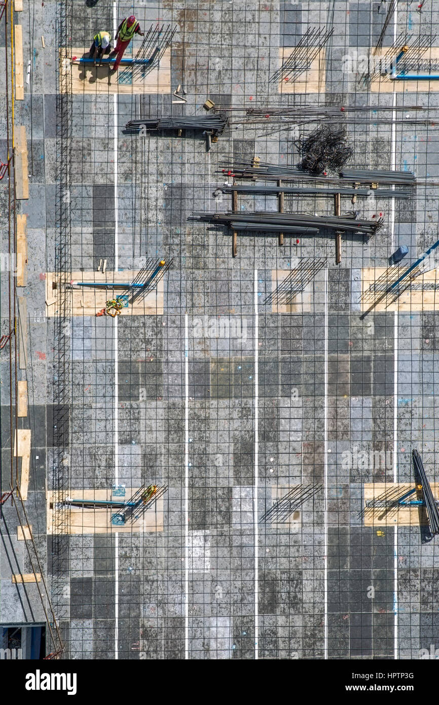 Two workers on construction site, top view Stock Photo - Alamy