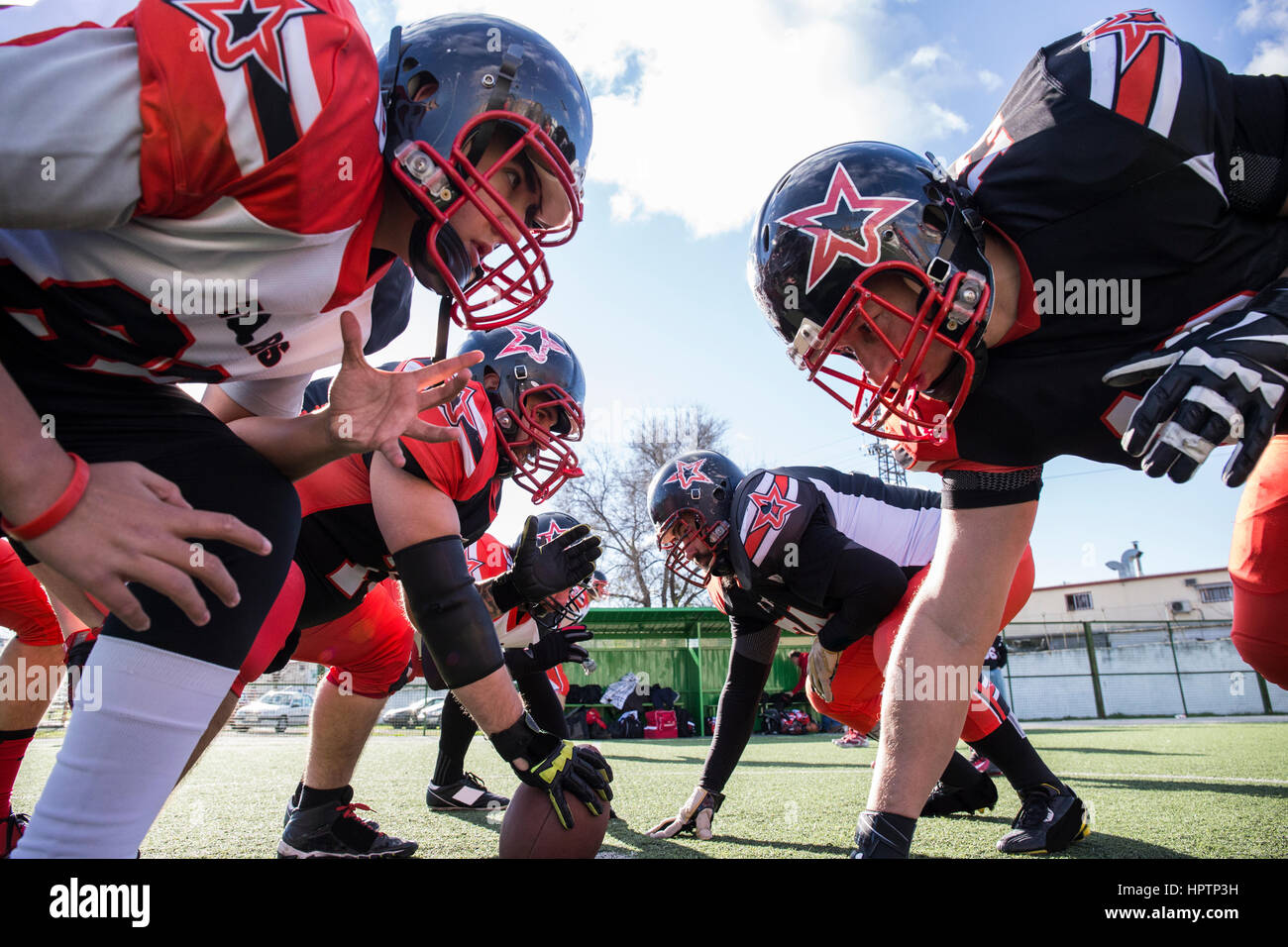 American football players on the line of scrimmage during a match Stock ...