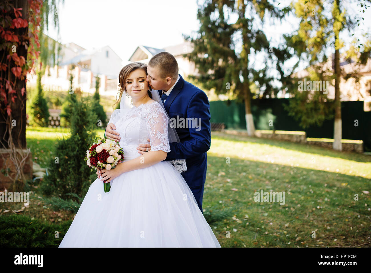 Couple hugging in wind hi-res stock photography and images - Alamy