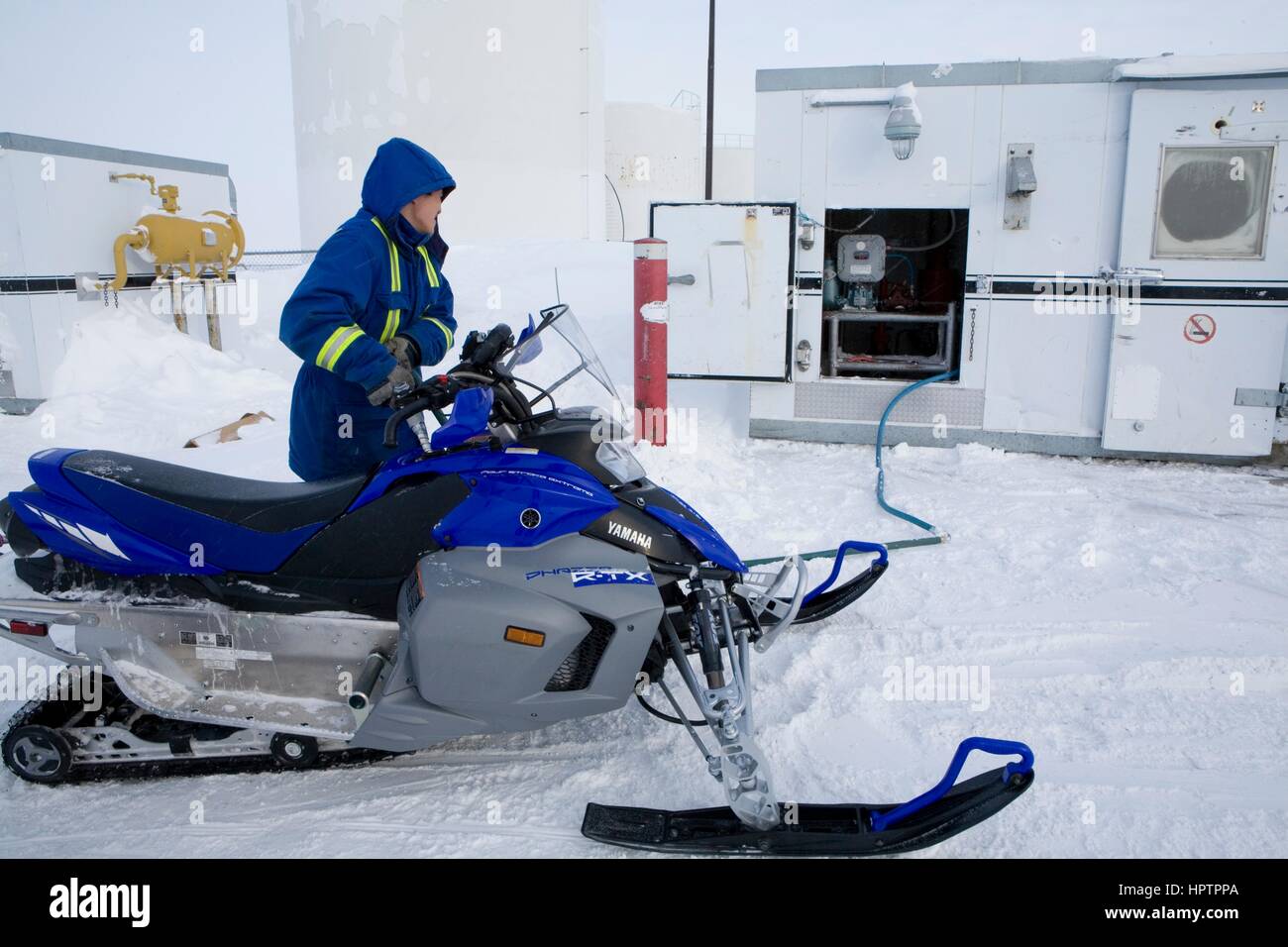 Snowmobile inuit hi-res stock photography and images - Alamy