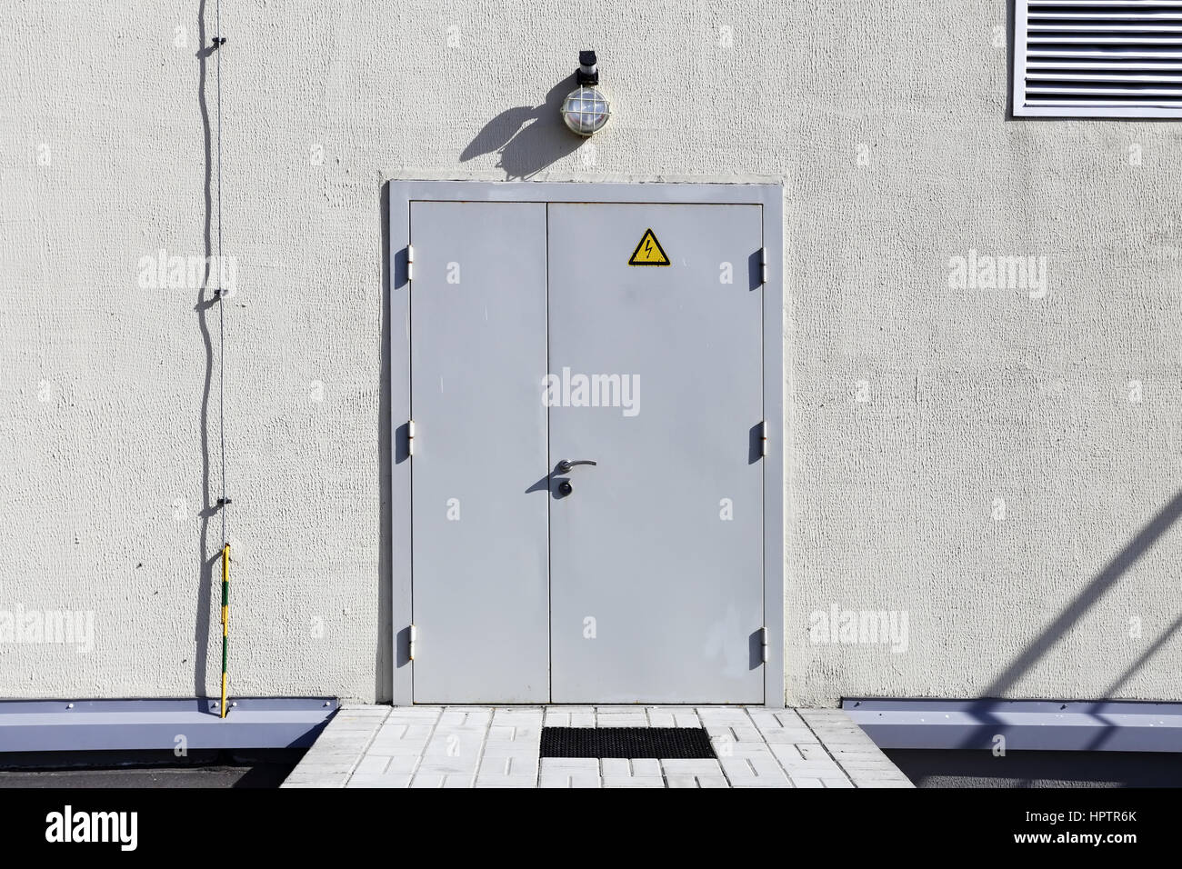 metal door entrance to electrical plant Stock Photo - Alamy